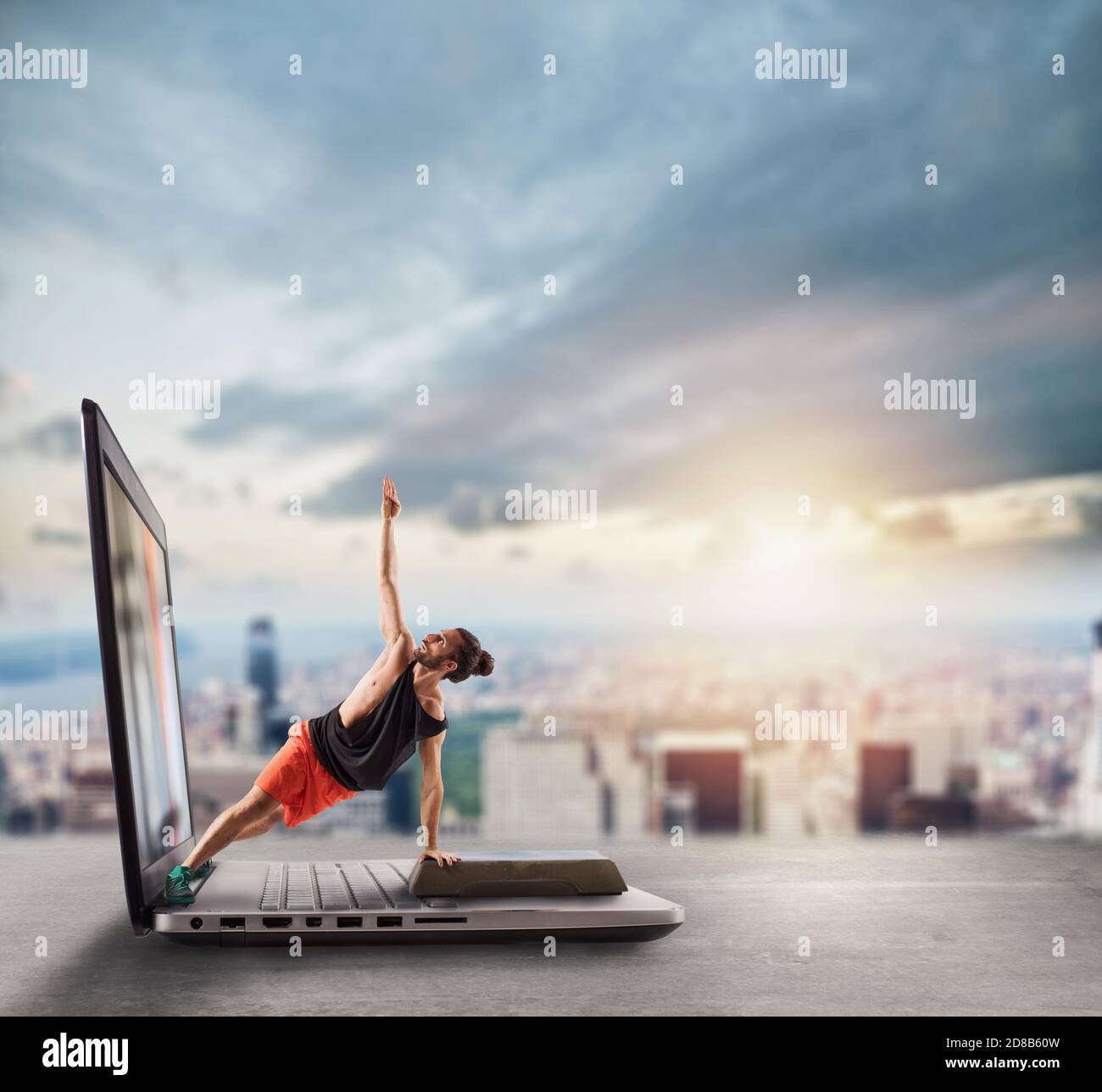 Personal trainer does gym lesson through internet and laptop Stock ...