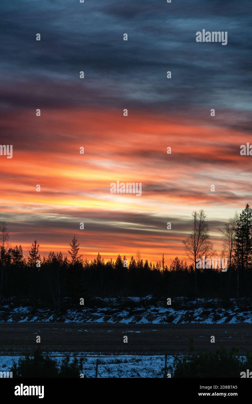 Vertical photo of spectacular extremely red orange colored sunrise over ...