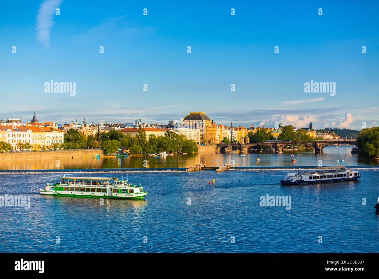 Summer landscape of Prague view of the Ltava river on which ferries ...