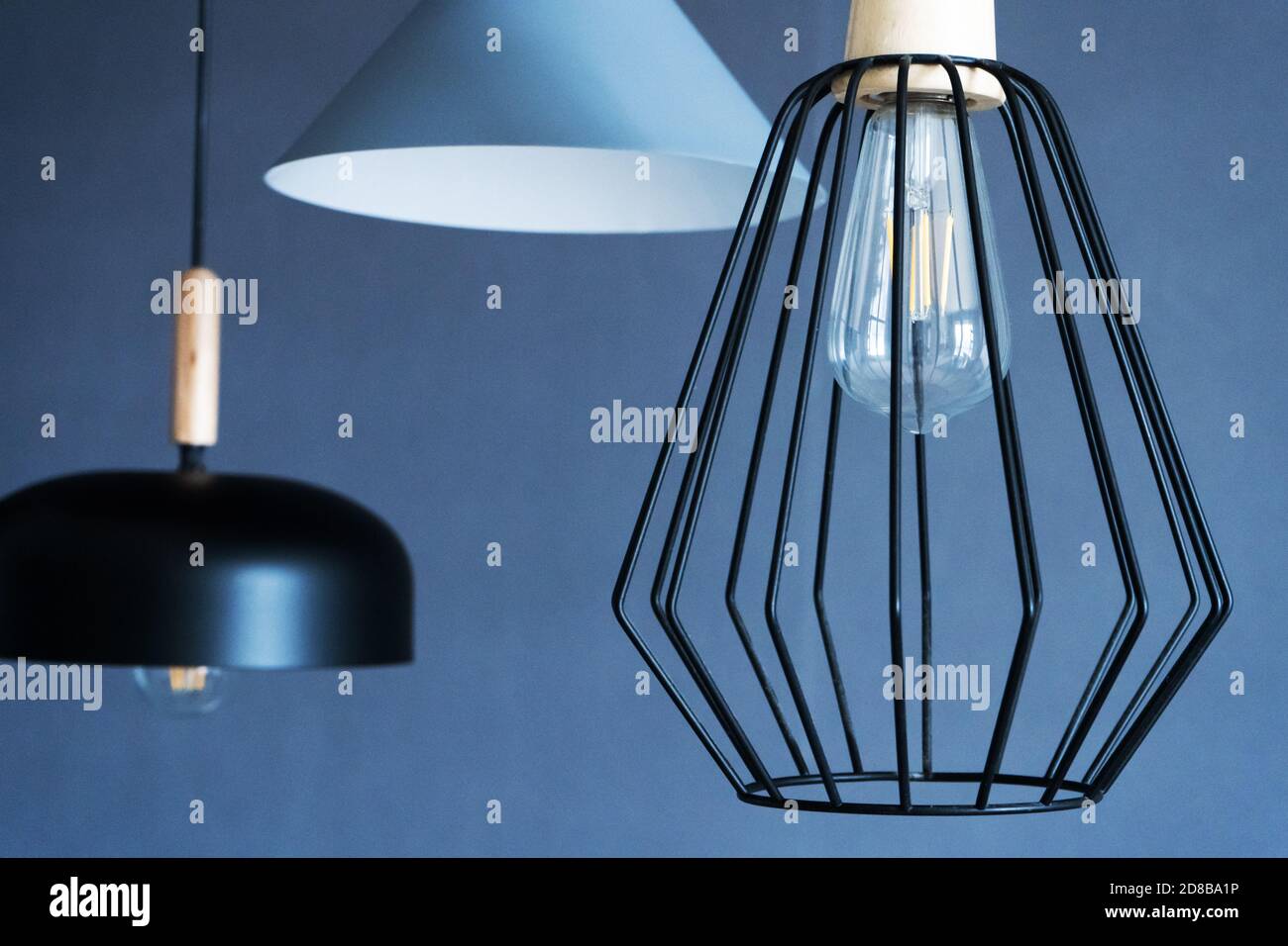 Interior decoration of stylish housing. Loft style incandescent lamp ...