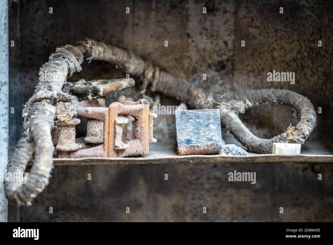 Old towing cable lying on a shelf in an abandoned workshop Stock Photo ...