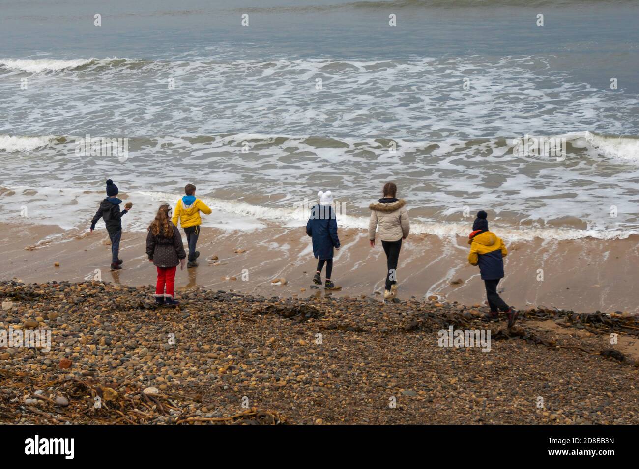 Side boys hi-res stock photography and images - Alamy