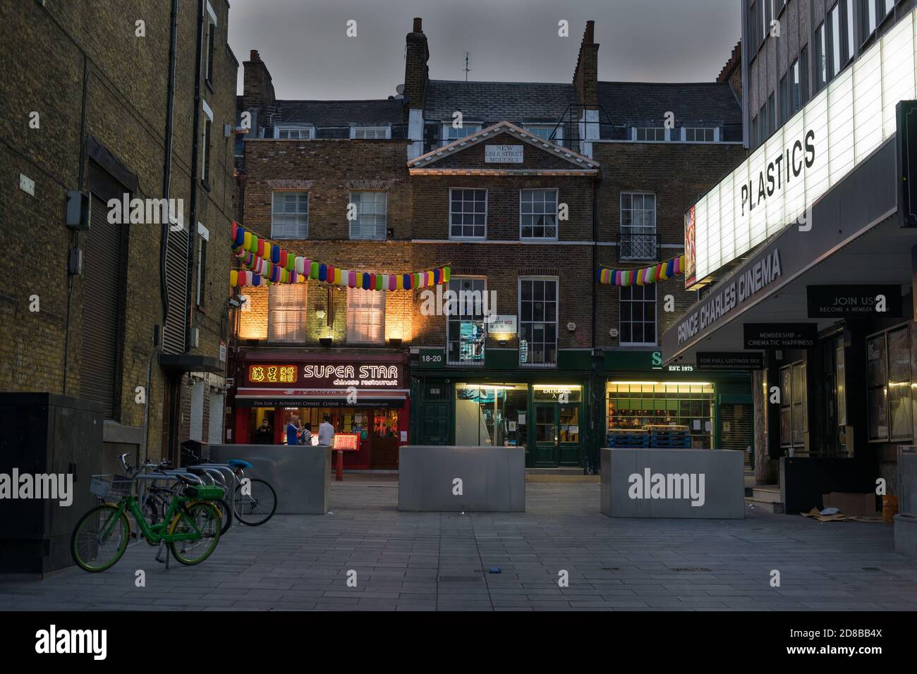 New Lisle Street at night with the Prince Charles Cinema lit up. London ...