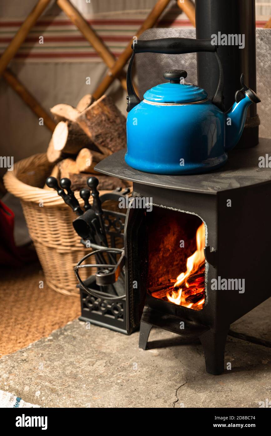 Log Fire in Glamping Yurt Stock Photo - Alamy