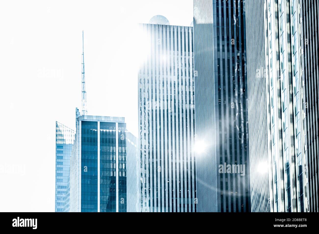 Modern city buildings with morning light Stock Photo - Alamy