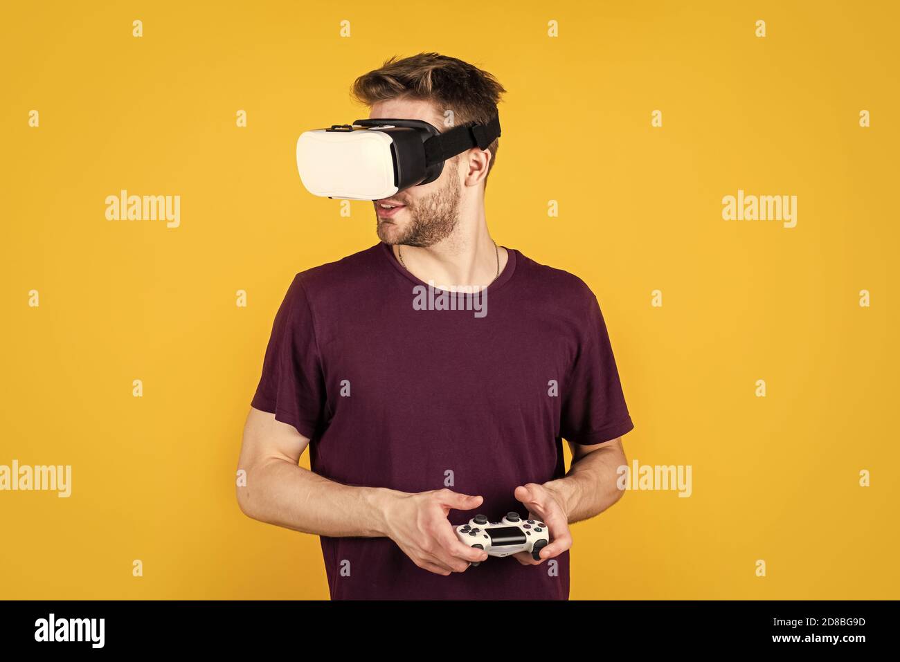 It is so real. man wearing virtual reality goggles. game console using ...