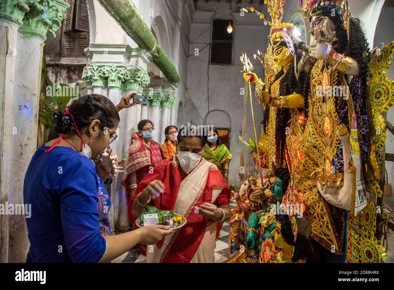 Kolkata, India. 26th Oct, 2020. Different moments of Debi Baron rituals ...
