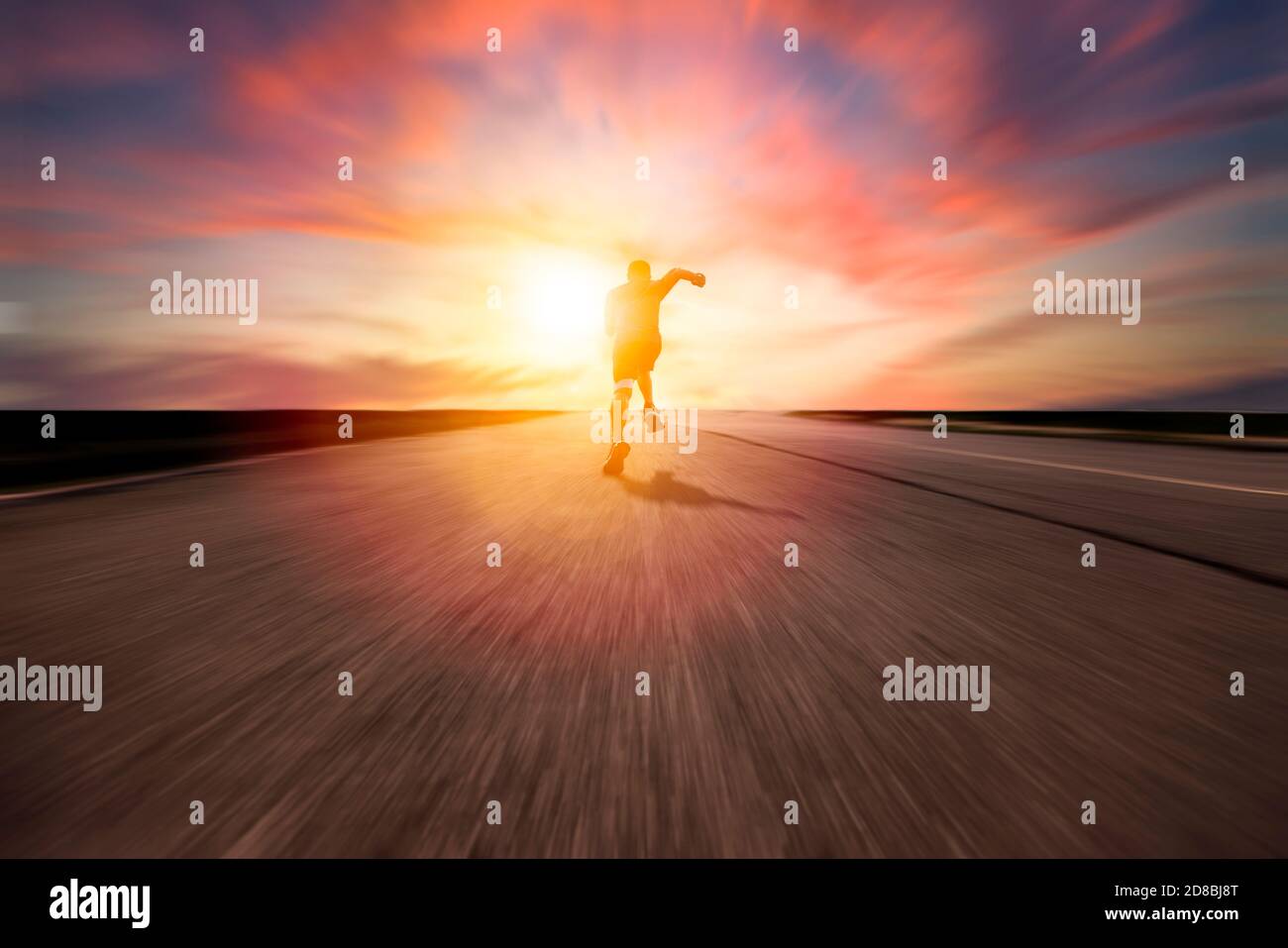 rear view man running and sprinting on the road with blur background ...