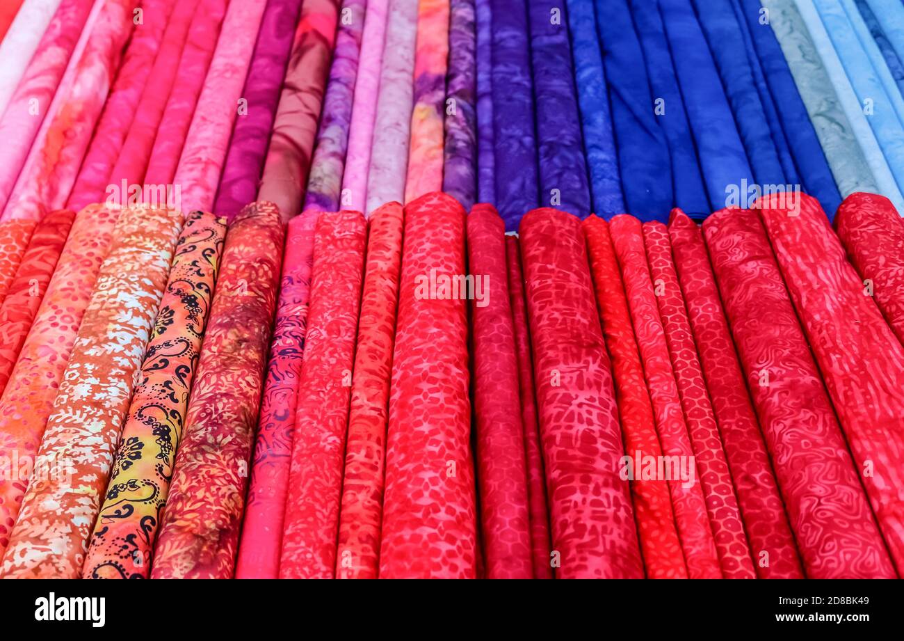 Detailed close up view on samples of cloth and fabrics in different ...