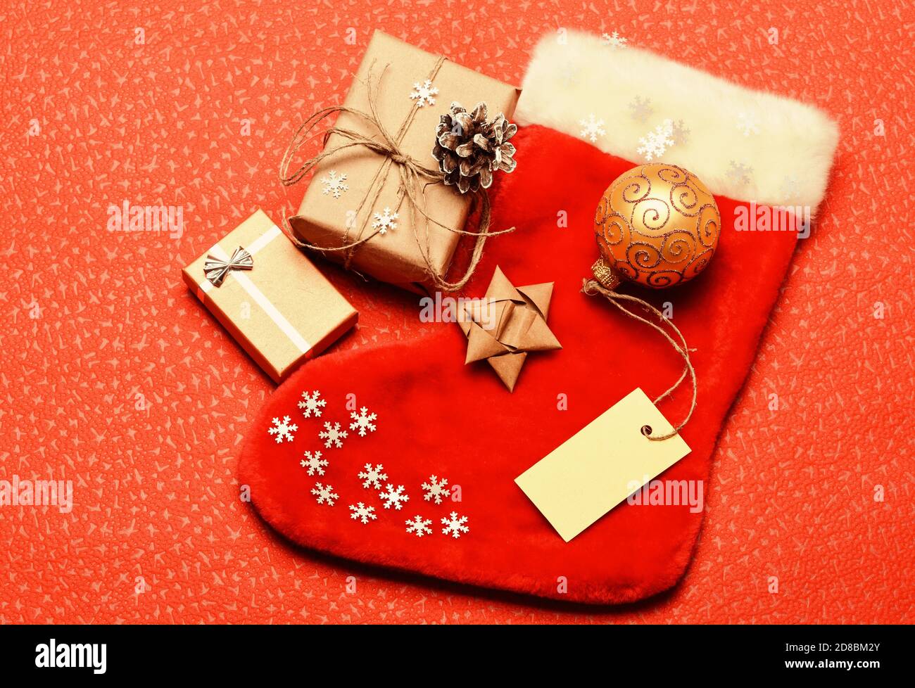 Christmas sock red background top view. Traditional christmas attribute ...