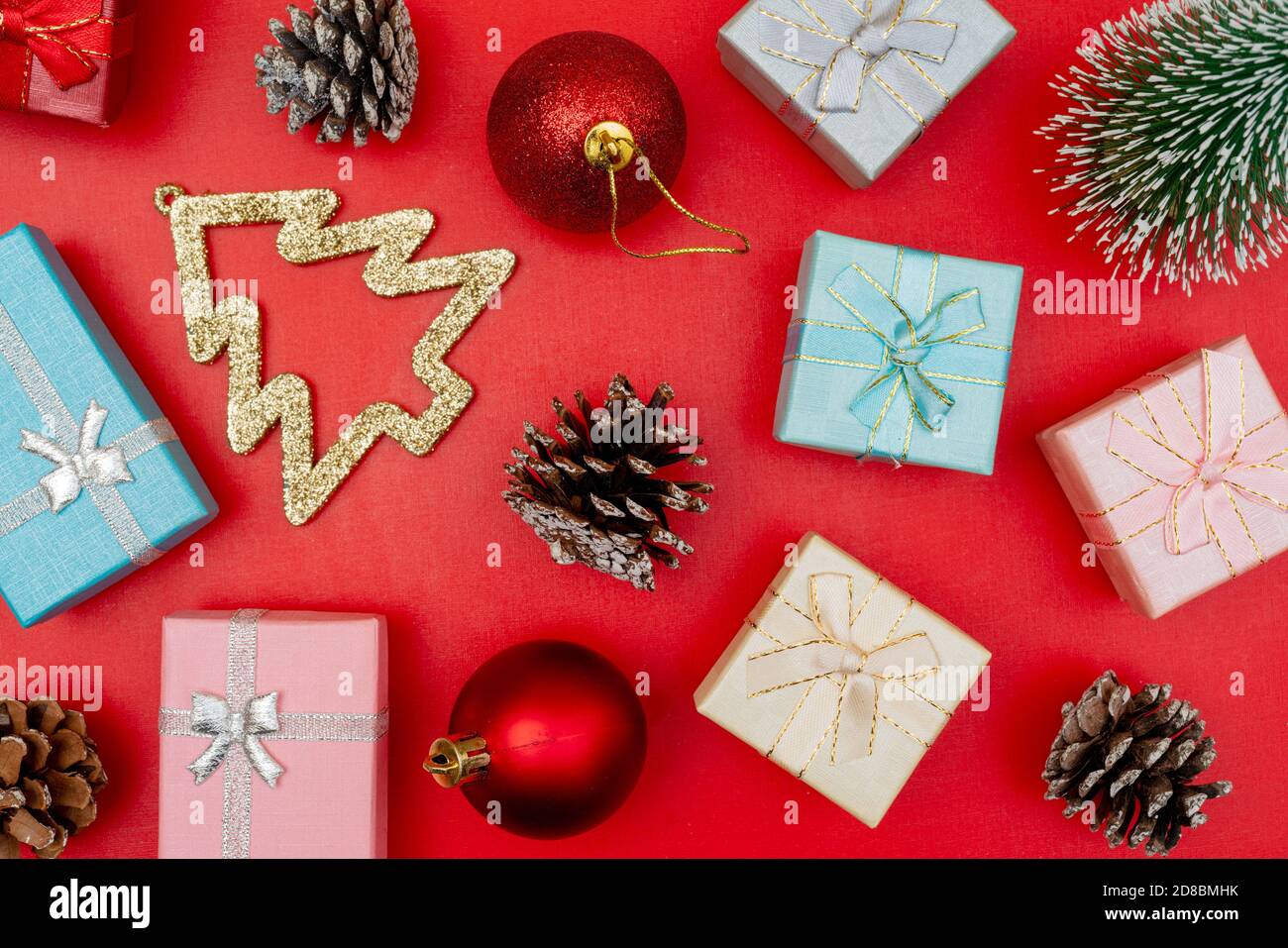 Flat lay of Christmas tree decorations and gift boxes Stock Photo - Alamy