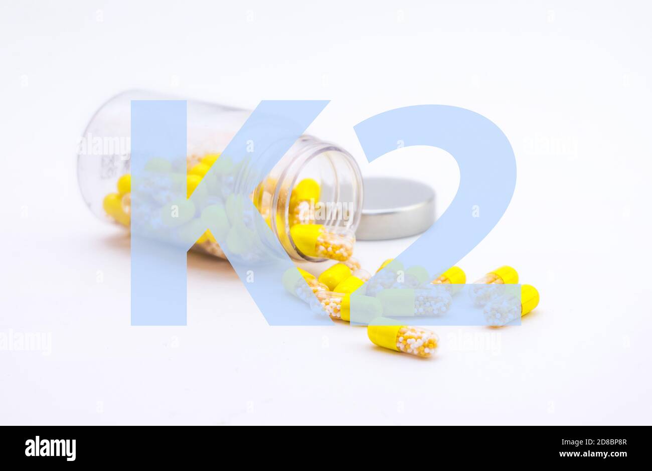 Open Container with Vitamin K2 capsules isolated on white and written K2 word Stock Photo - Alamy