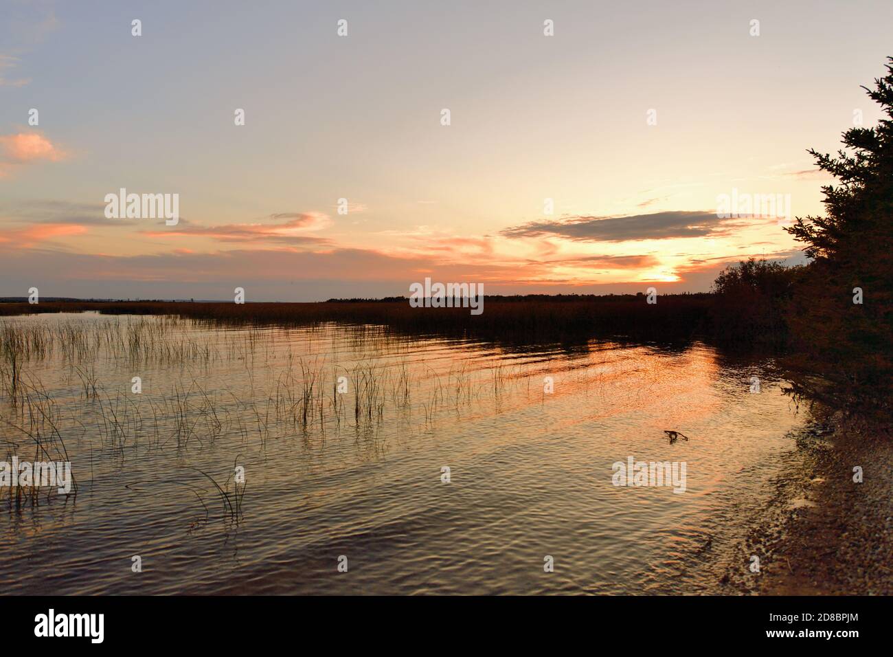 St. Ignace, Michigan, USA. An autumn sunset over Lake Michigan viewed ...