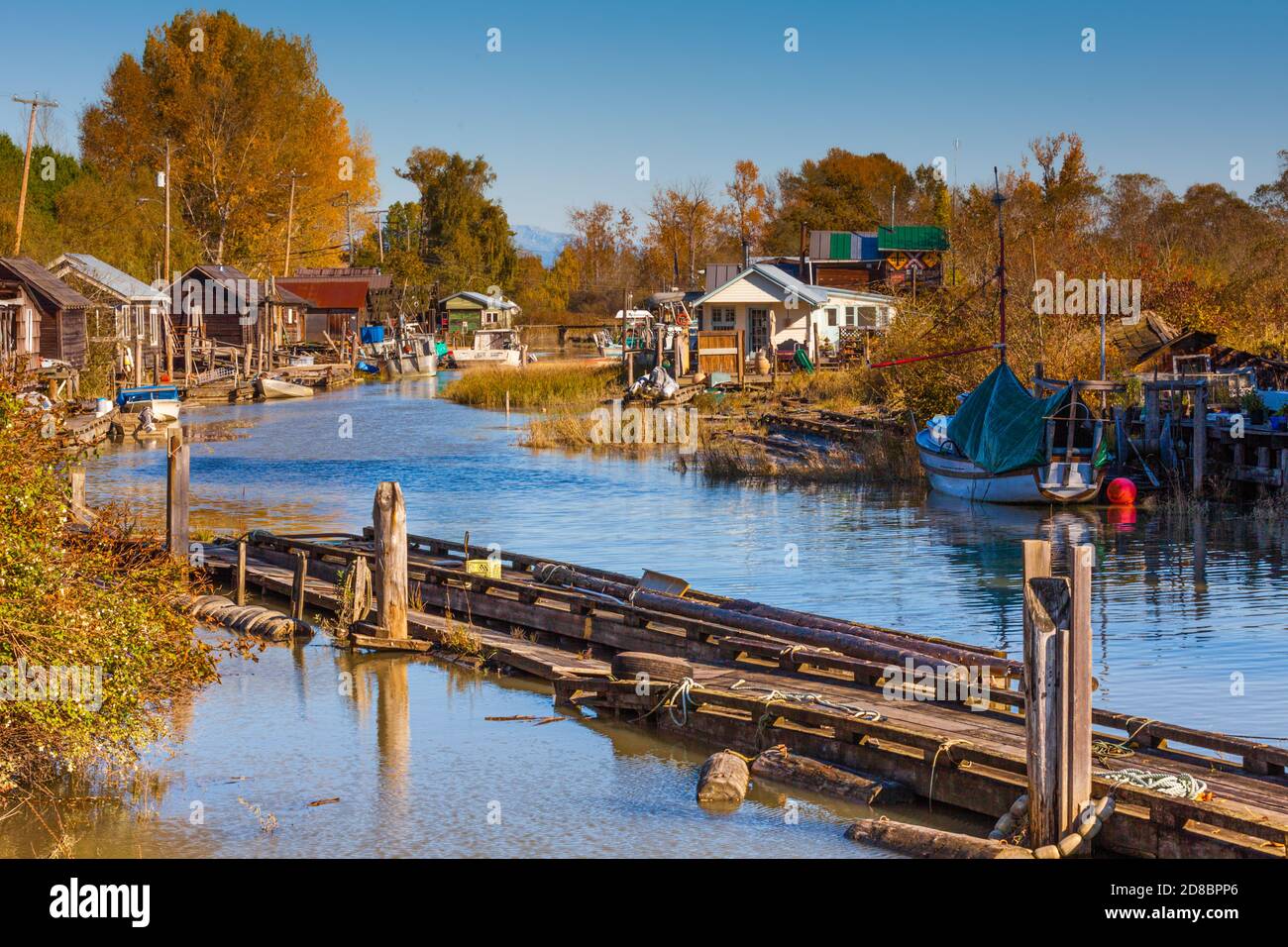 The coastal community of Finn Slough at high tide in Richmond British ...