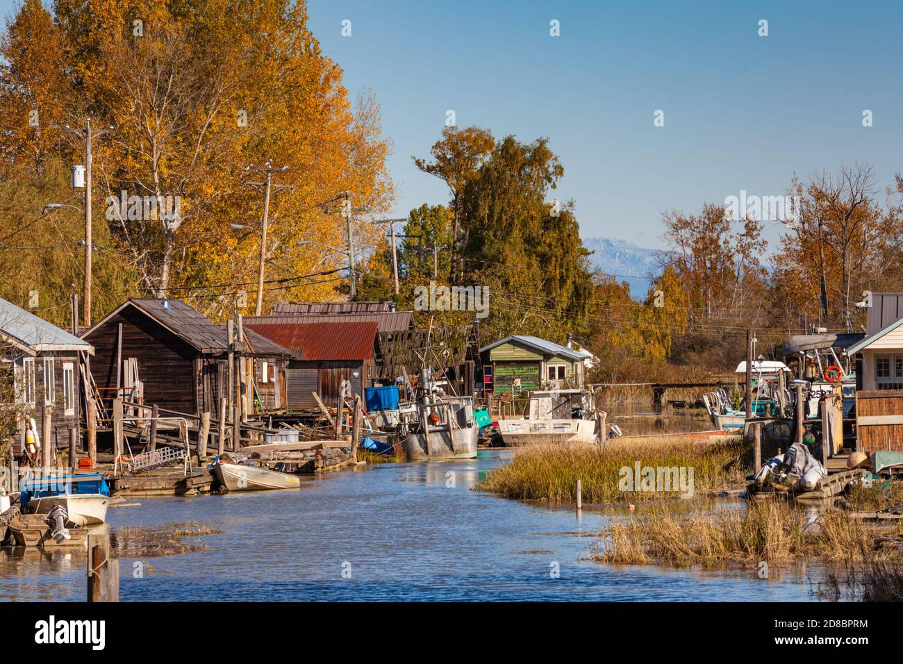 The coastal community of Finn Slough at high tide in Richmond British ...