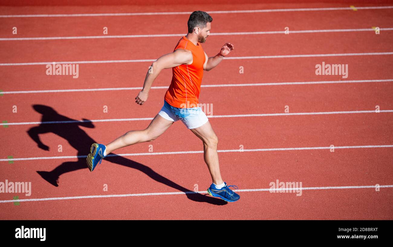 Athlete running fast track coach hi-res stock photography and images ...