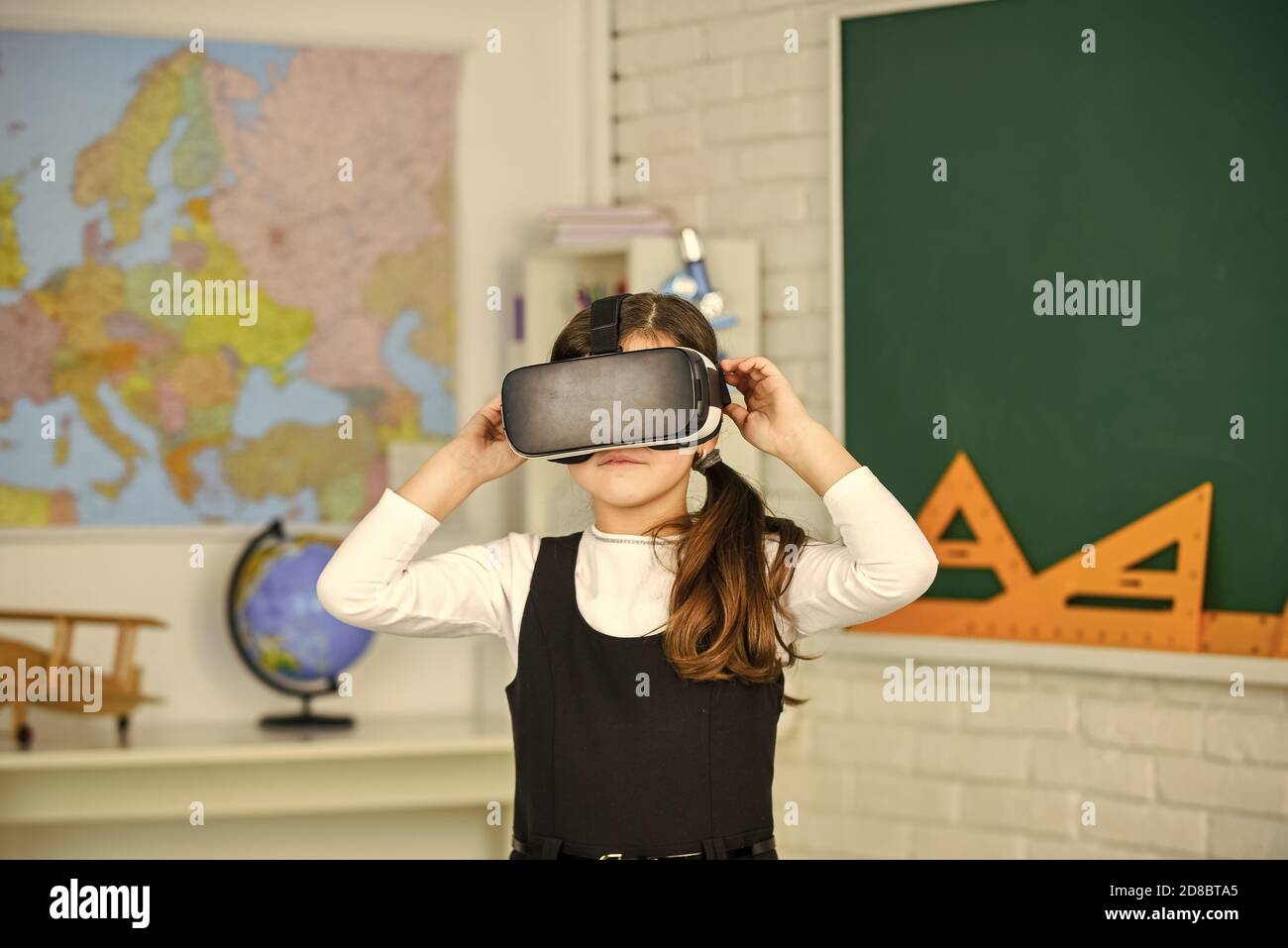 Virtual classes. Science Class. VR technology. schoolgirl using virtual ...