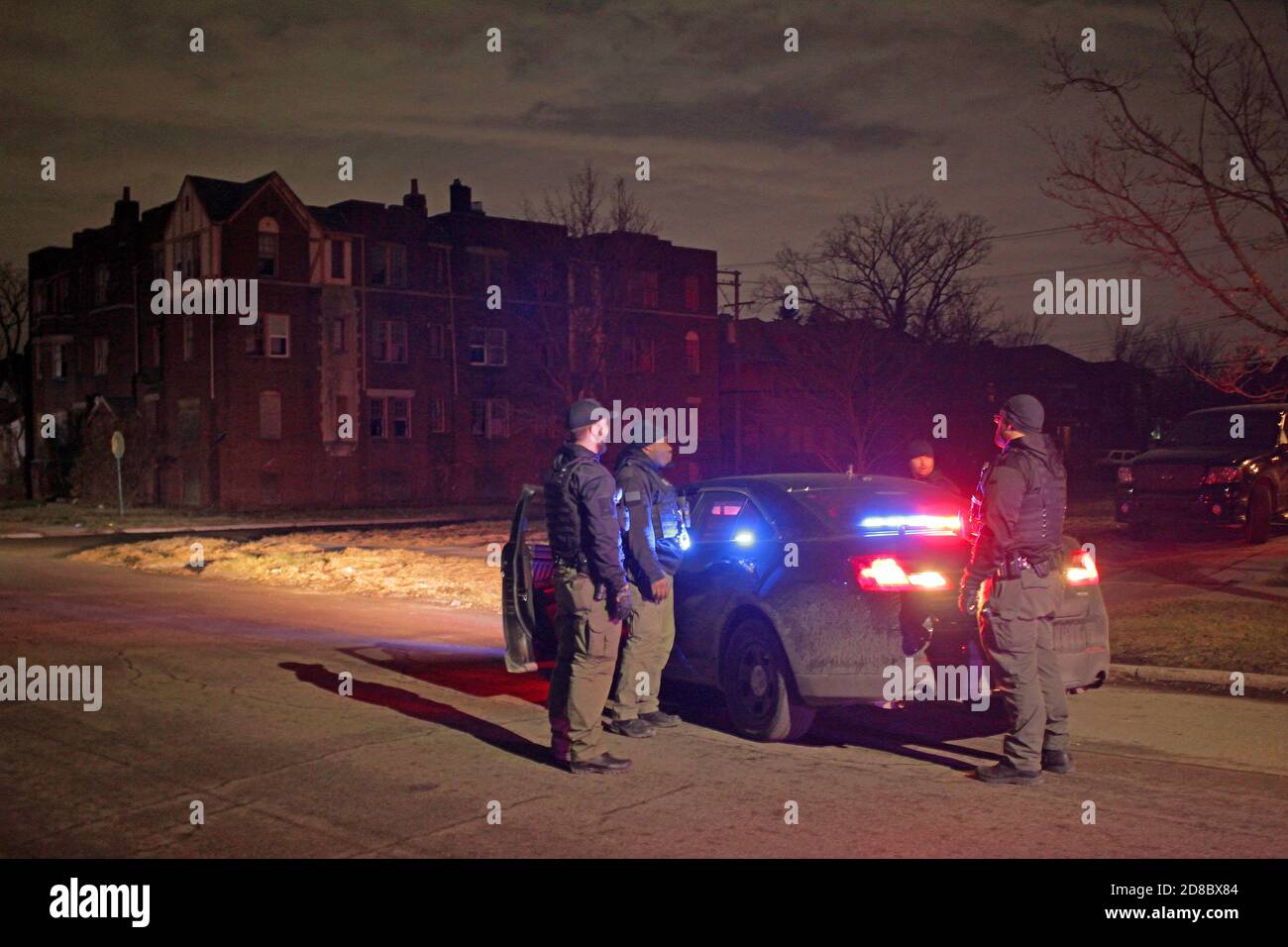 Detroit Special Operations police officers in the street at night ...