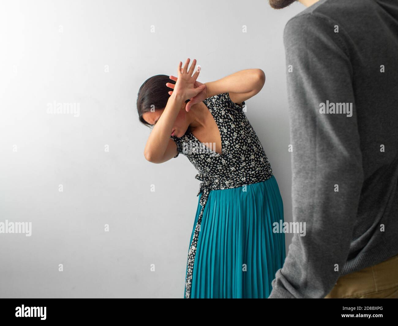 Scared young woman covers face hi-res stock photography and images - Alamy