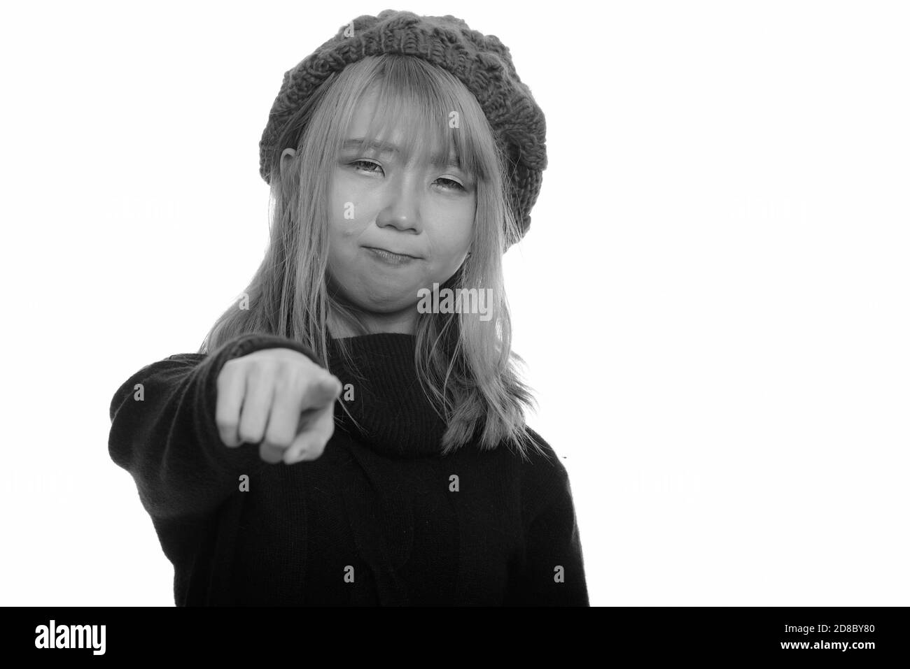 Young cute Asian woman pointing finger at camera Stock Photo - Alamy