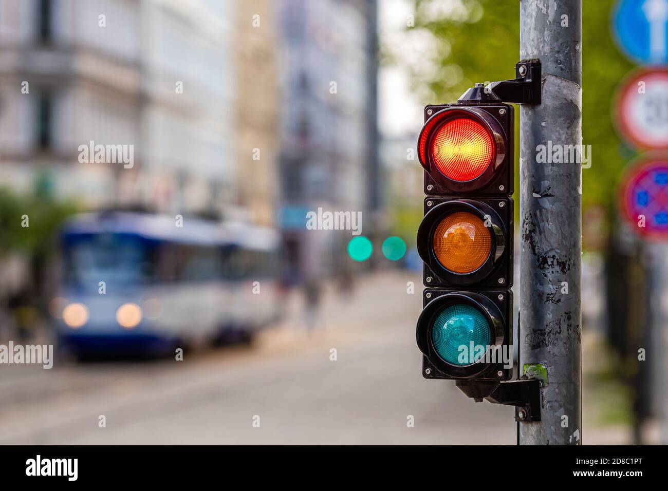 a city crossing with a semaphore, red light in semaphore, traffic ...