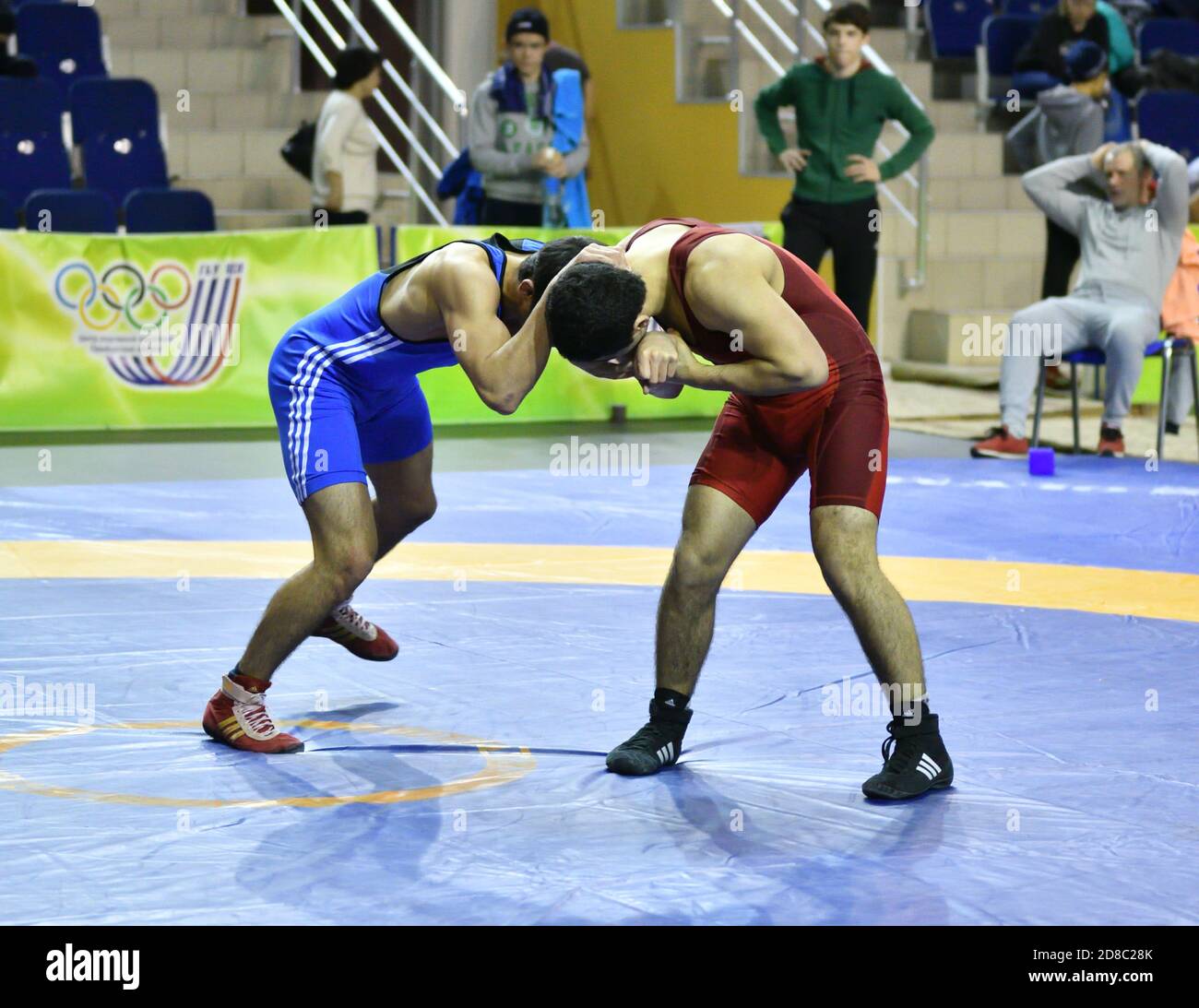 Orenburg, Russia - March 15-16, 2017: Young men compete in the sports ...