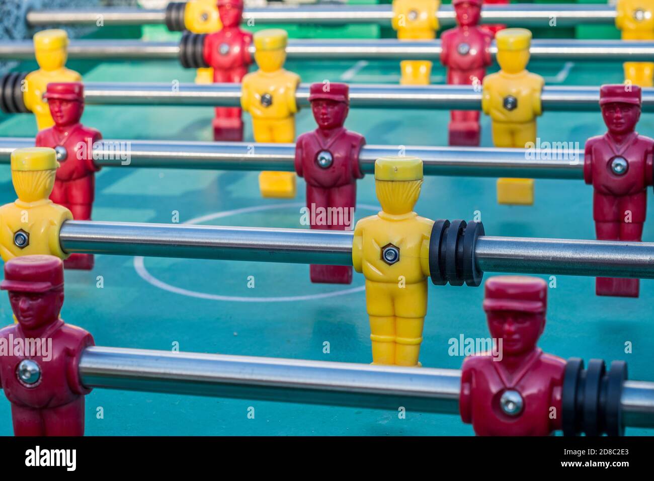 Shot of a table football with colorful players and green ground Stock ...