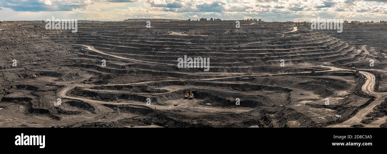 Panoramic aerial view of coal mine. Open pit mine industry, big yellow ...