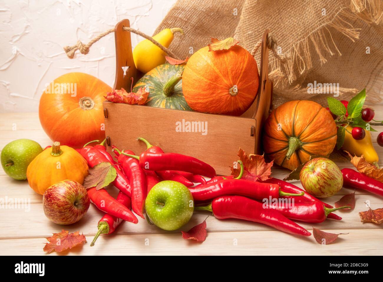 Rustic fall greeting card background with pumpkin in the wooden box ...