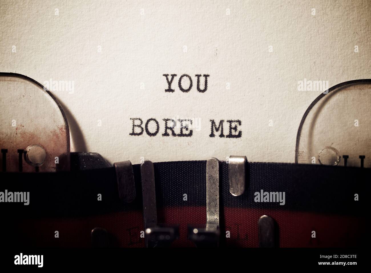 You bore me phrase written with a typewriter Stock Photo - Alamy