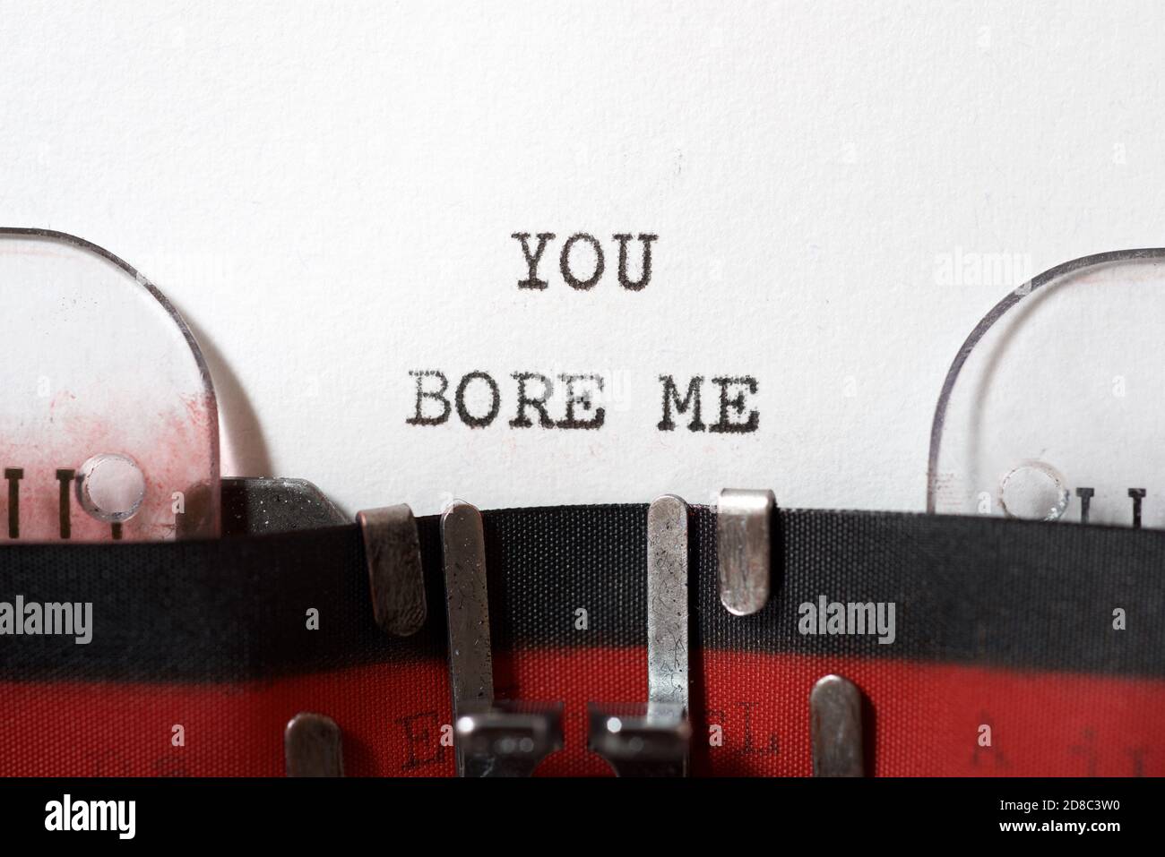 You bore me phrase written with a typewriter Stock Photo - Alamy