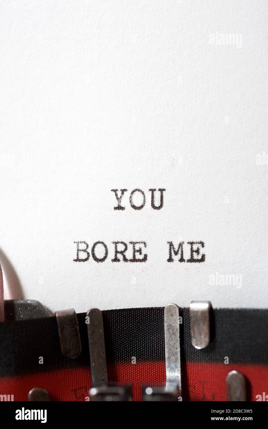 You bore me phrase written with a typewriter Stock Photo - Alamy
