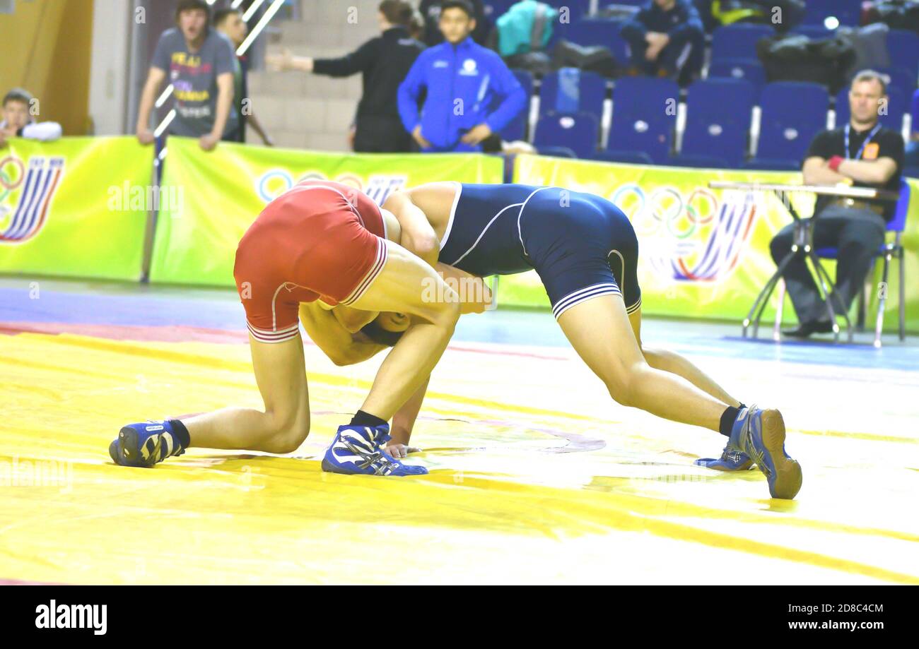 Orenburg, Russia - March 15-16, 2017: Young men compete in the sports ...