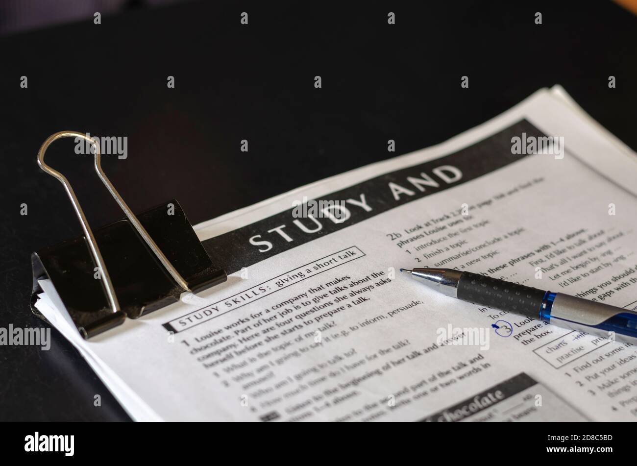 Exam tickets and a pen on the table. Partially completed multiple ...