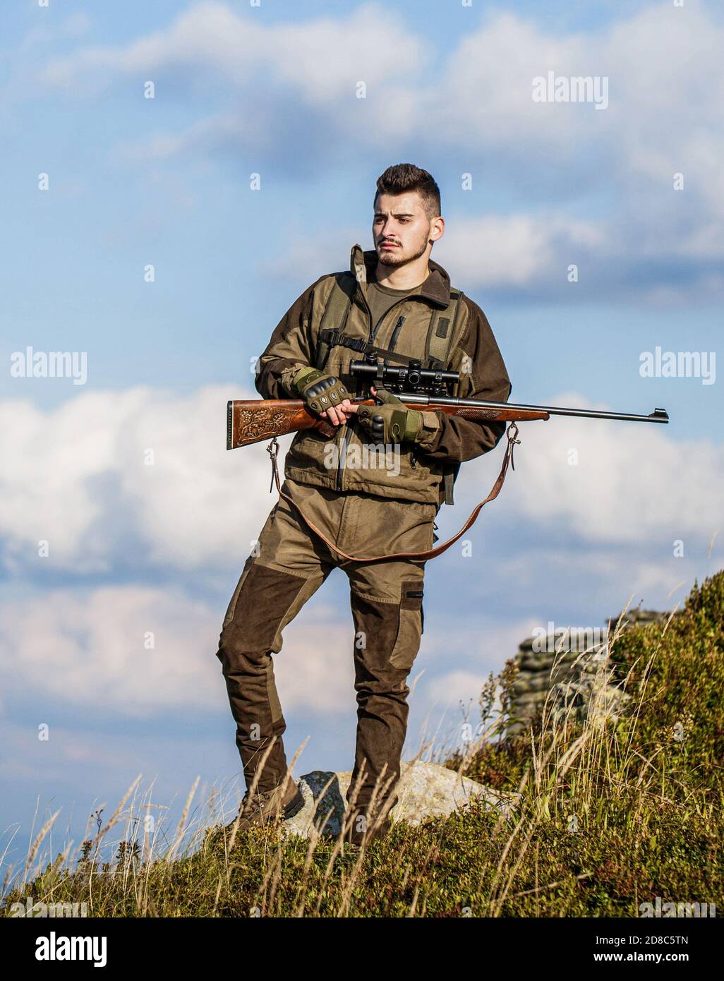 The man is on the hunt. Hunt hunting rifle. Hunter man. Hunting period ...