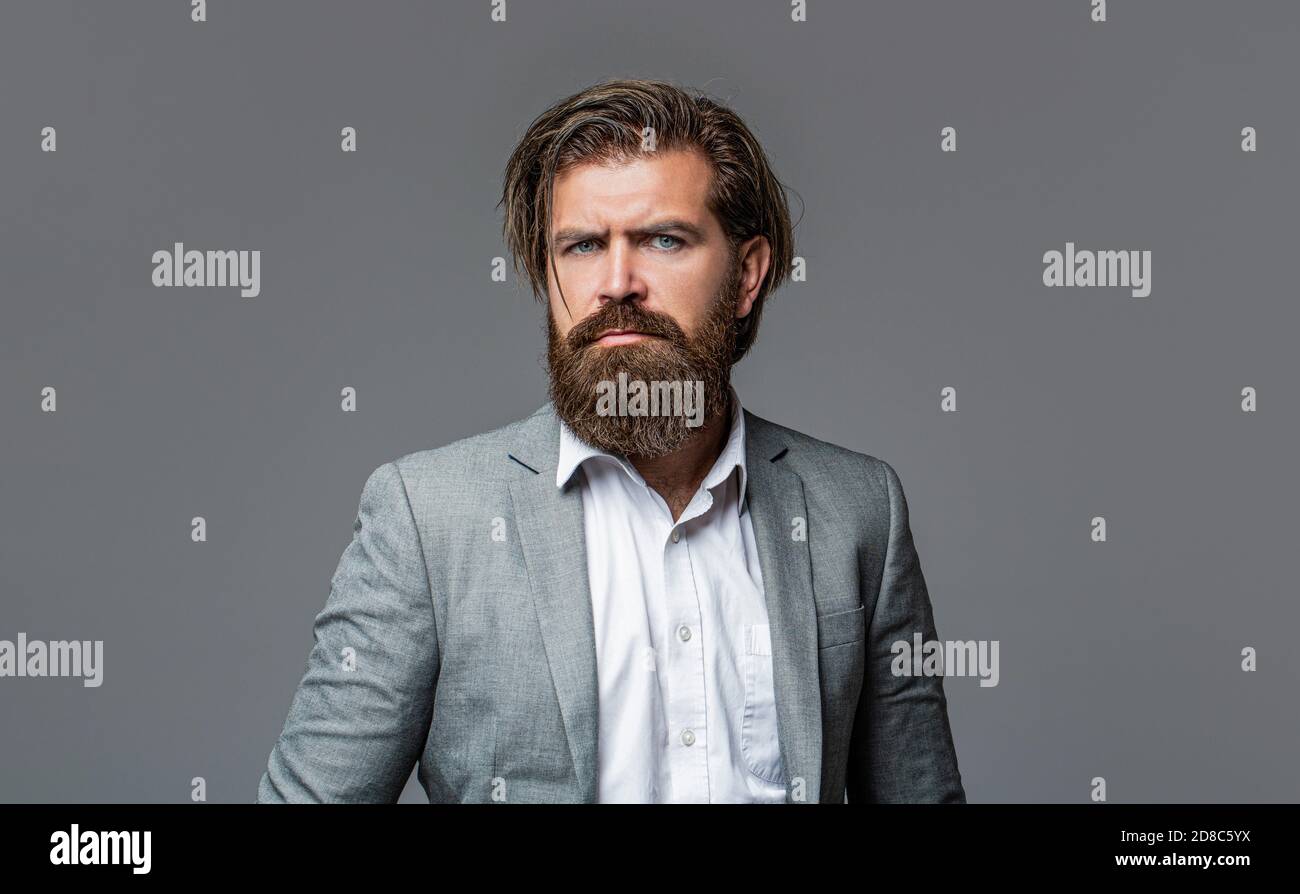 Handsome bearded man in suit hi-res stock photography and images - Alamy