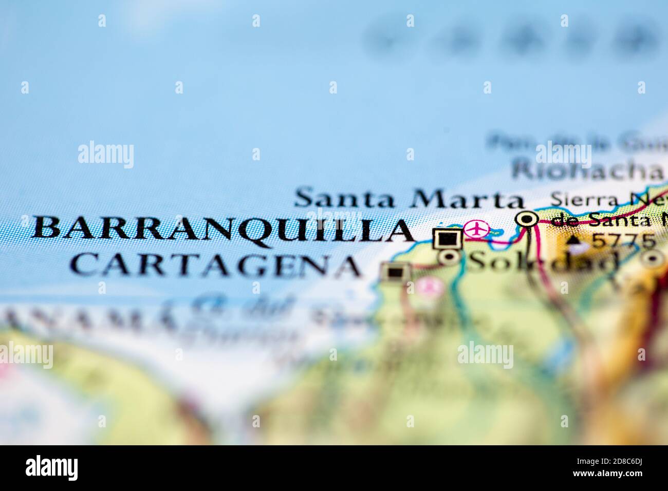 Shallow depth of field focus on geographical map location of ...