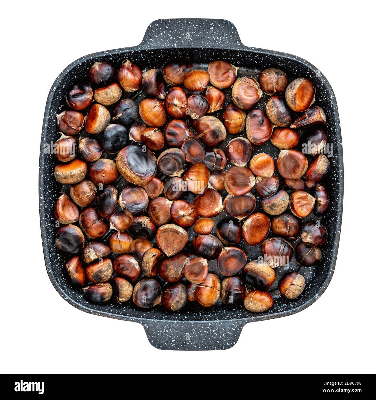 Roasted chestnuts served in a chestnut pan isolated on white background ...