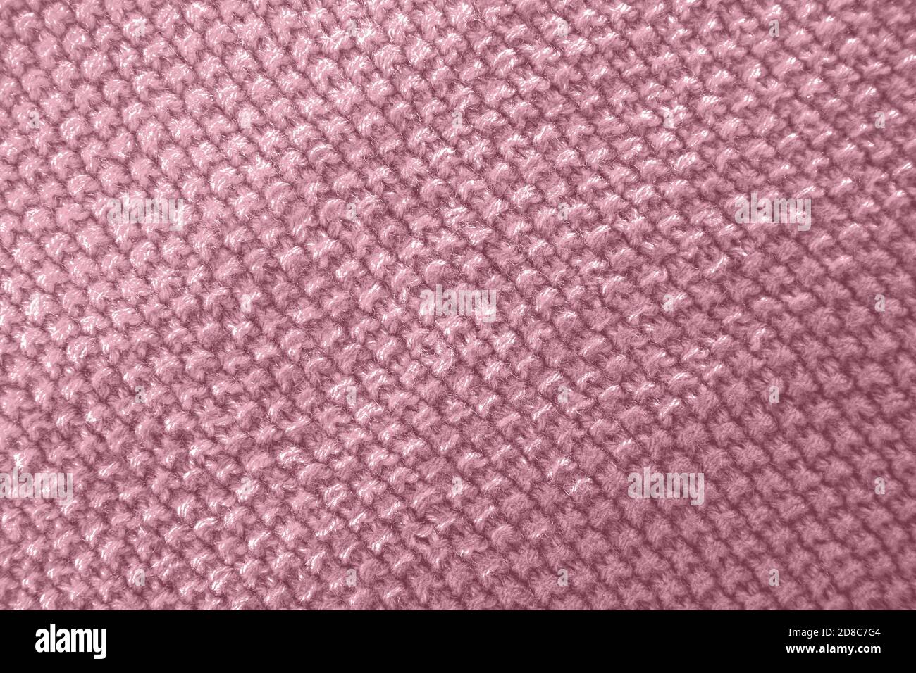Knitted texture in pink color. Close up Stock Photo - Alamy