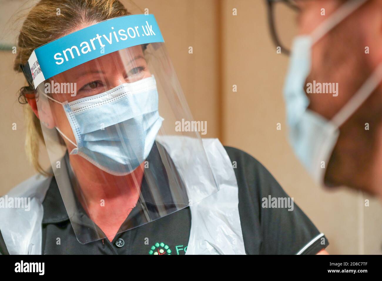 Forest of Dean physiotherapist Fiona Greaves treats a patient wearing a ...