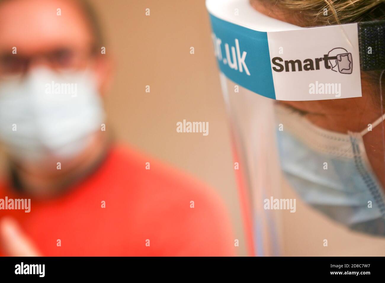 Forest of Dean physiotherapist Fiona Greaves treats a patient wearing a ...