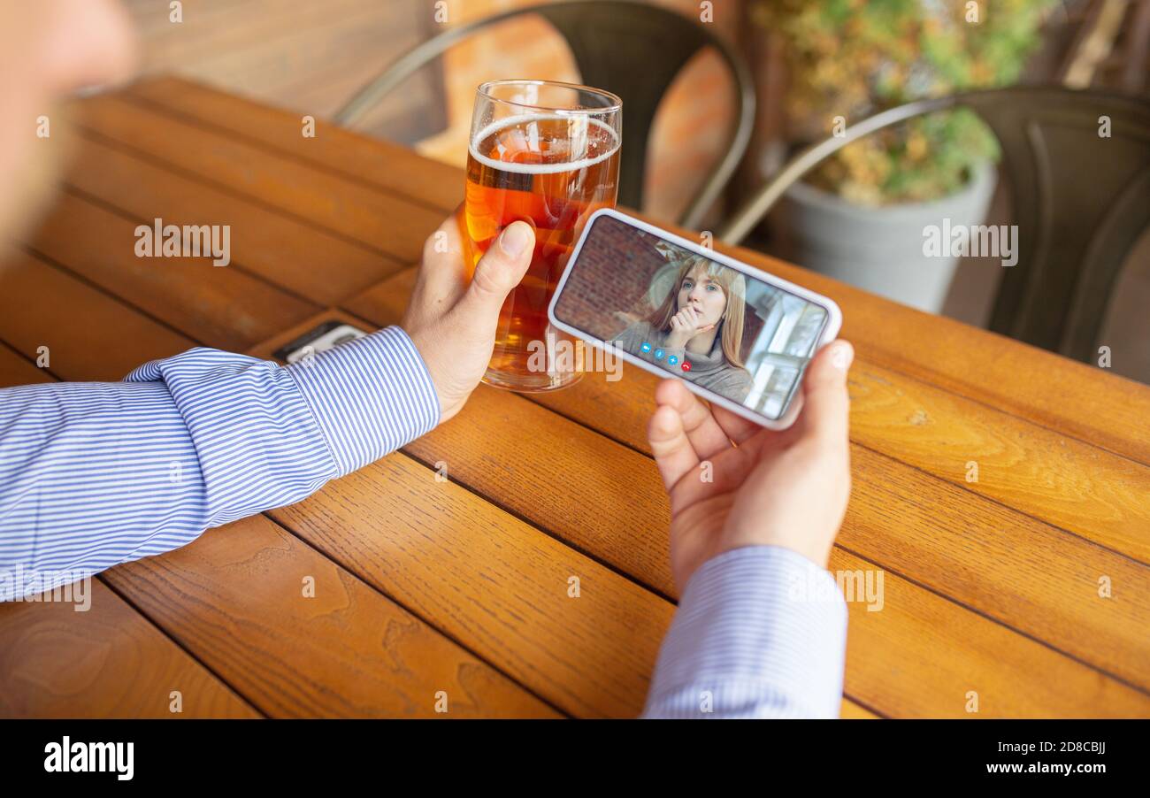 Remote working, online entertainment during quarantine. Man watching ...