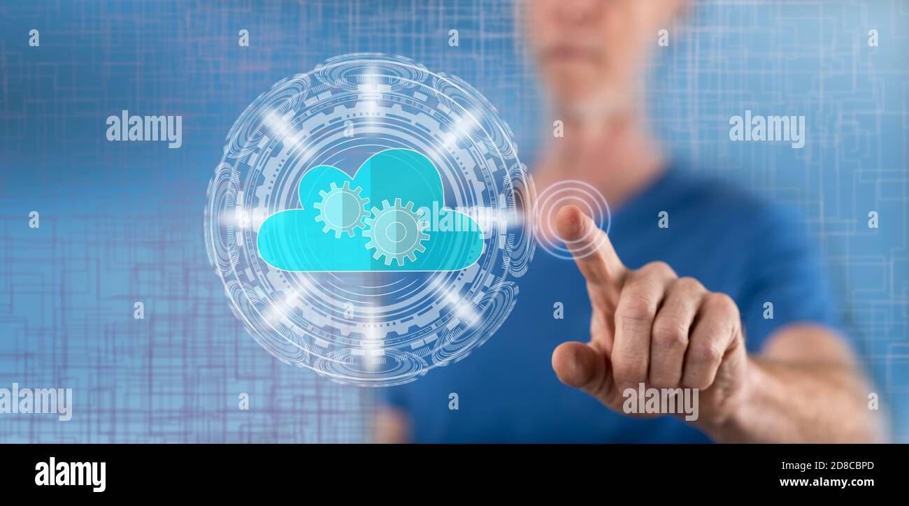 Man touching a cloud technology concept on a touch screen with his ...