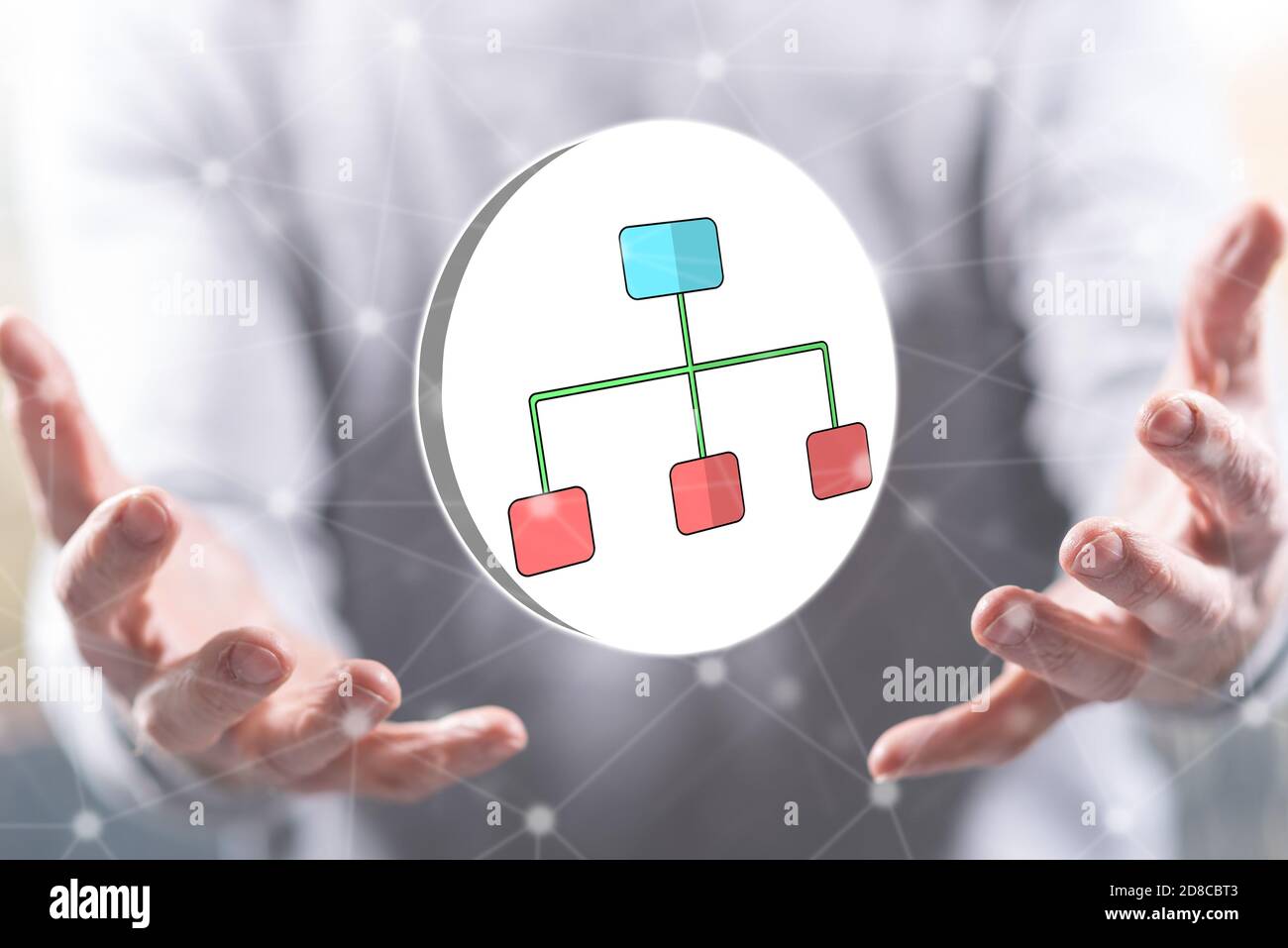 Hierarchy concept above the hands of a man in background Stock Photo ...