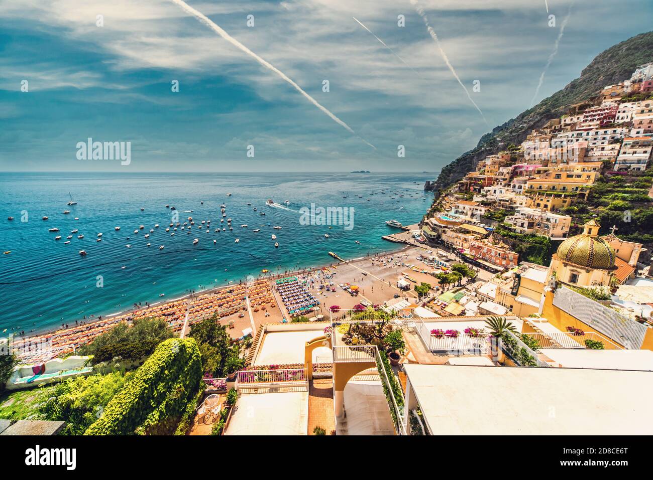 Amazing Amalfi coast with beach with parasols, hillside architecture ...