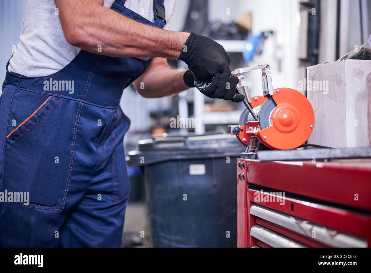 Man using grinding machine hi-res stock photography and images - Alamy