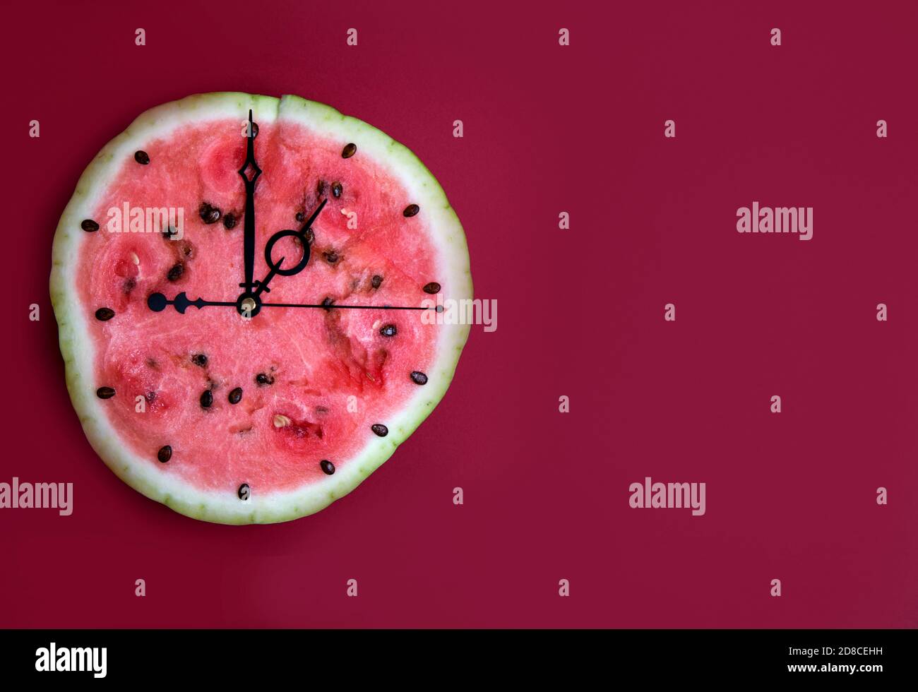Watermelon slice with arrows showing one hour on the clock, red ...