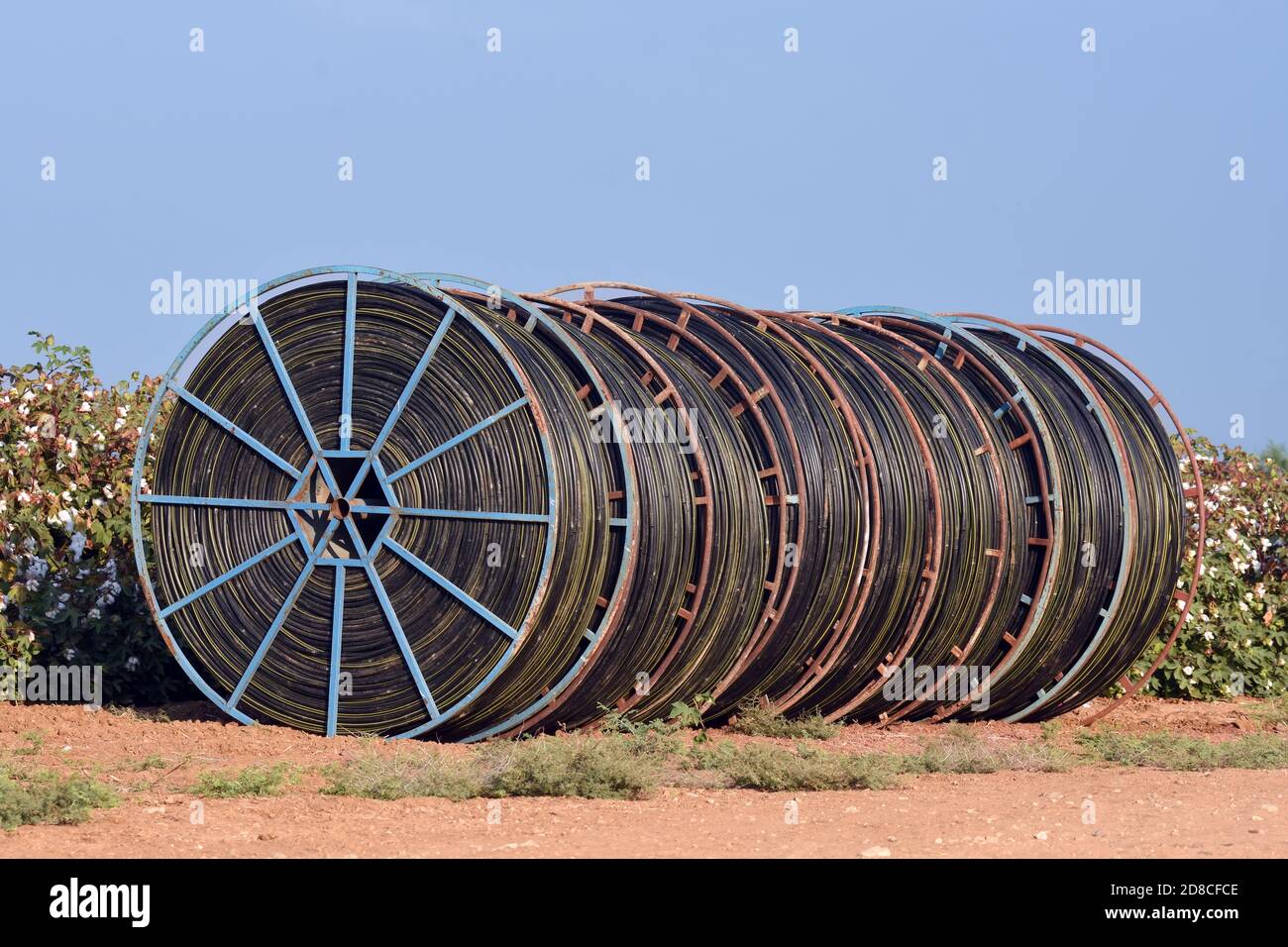 Water pipes stored in the field Agriculture Stock Photo - Alamy