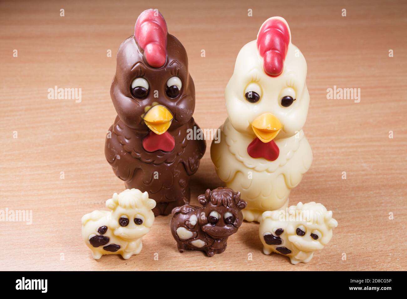 Chocolate cows and chicken made in white and milk chocolate for easter ...