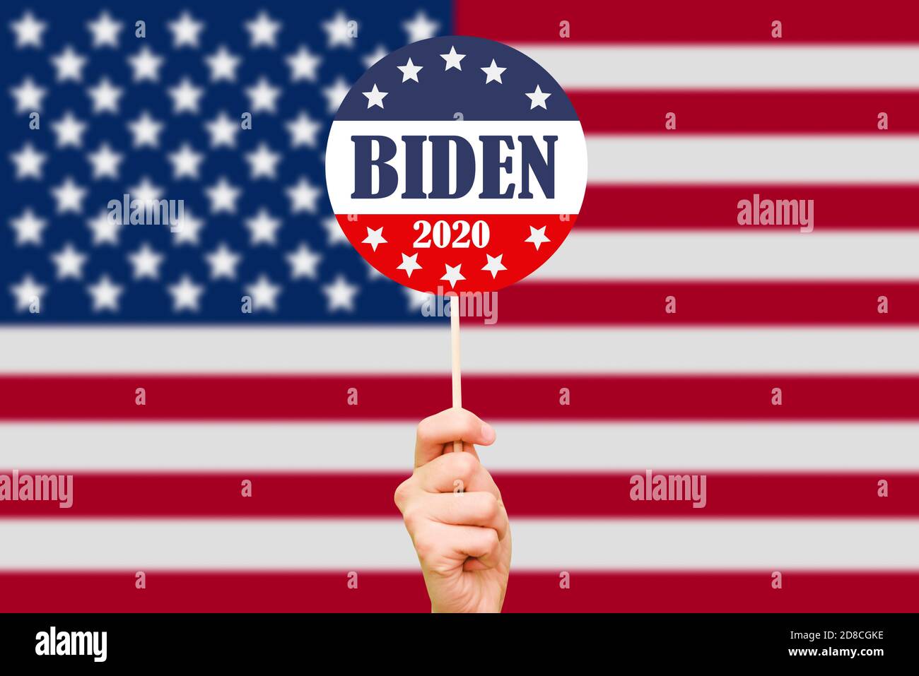 Joe Biden campaign button on the background of the USA flag. Election ...